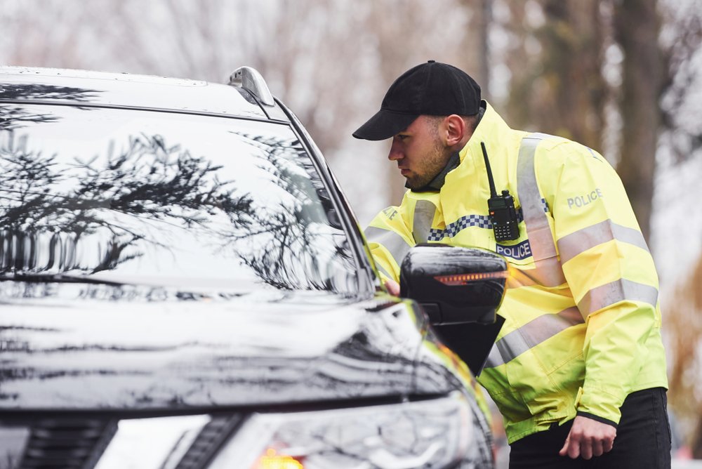 Is it illegal to drive without your license in your possession?